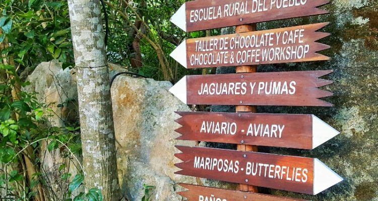 Xcaret sign aviary jaguars butterflies school and town | The Barefoot Nomad
